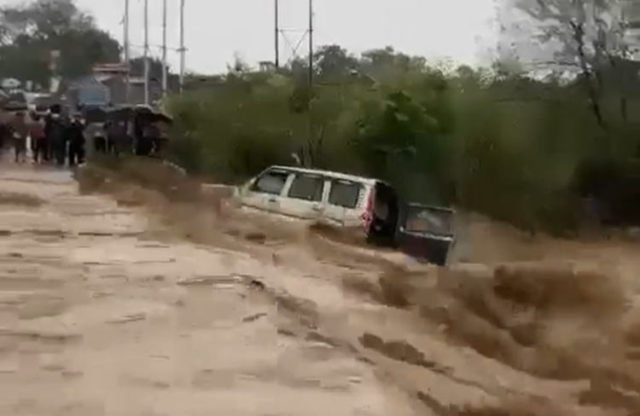 Torrential Rainfall in Haroli Causes Havoc: Scorpio Swept Away, Driver ...